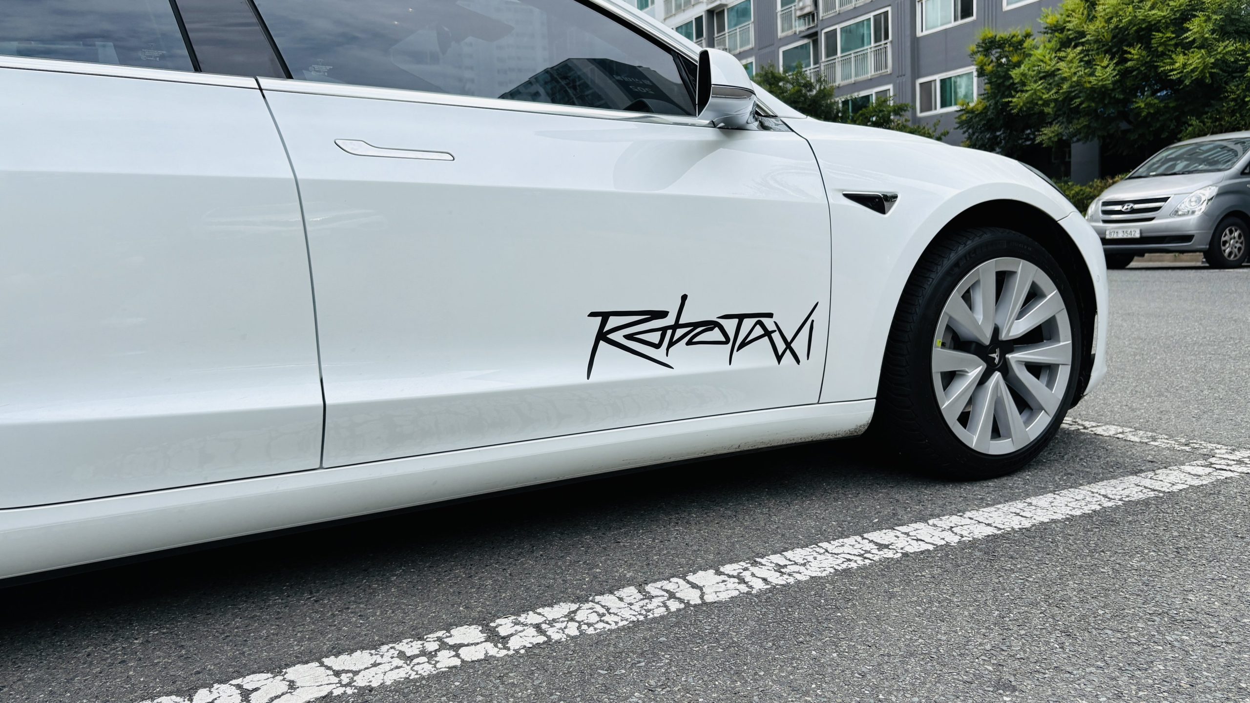 Tesla robotaxi decal TESLARATI